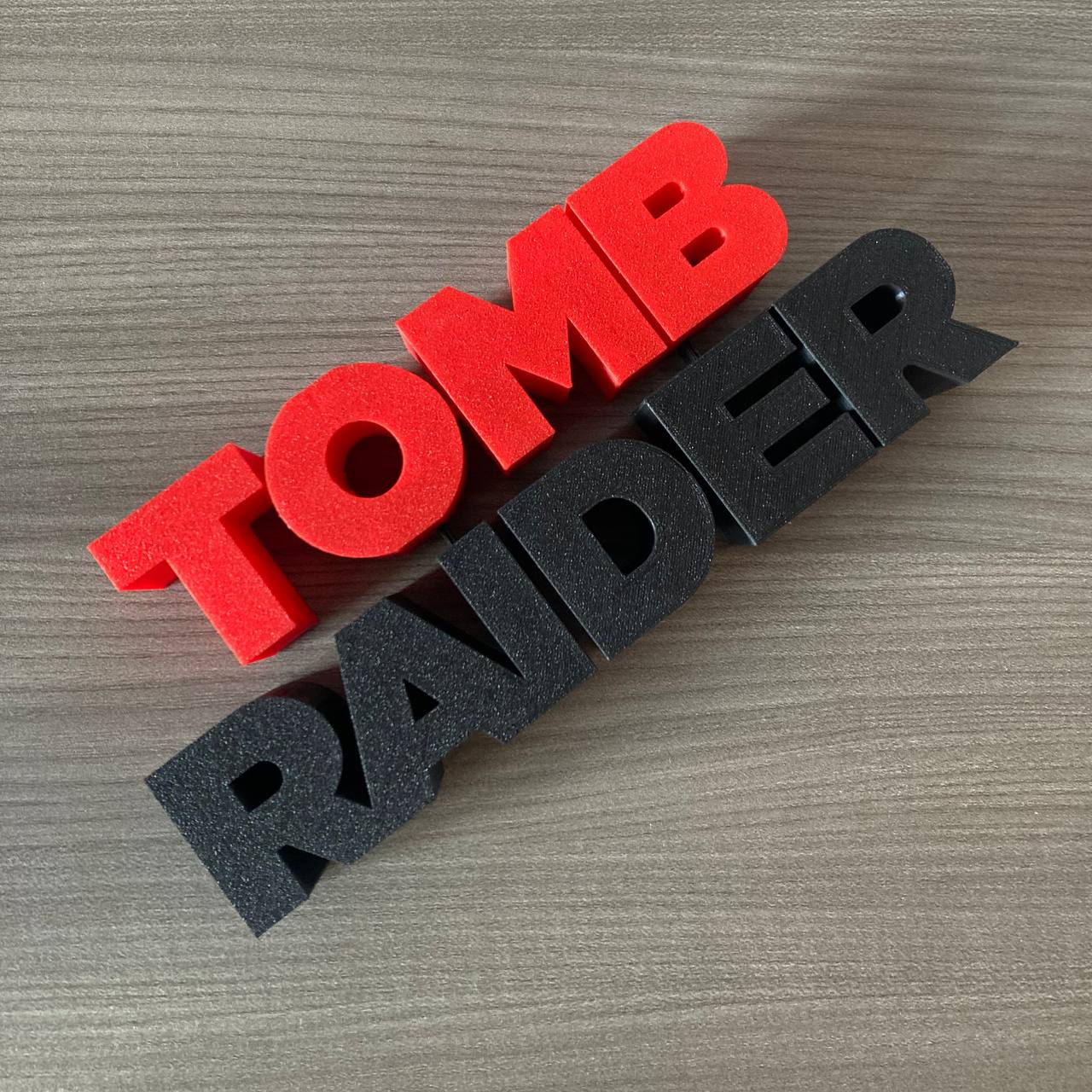 3D-Fankunst des TOMB RAIDER-Lara-Croft-Logos für Gaming-Desktop – Strike3D
